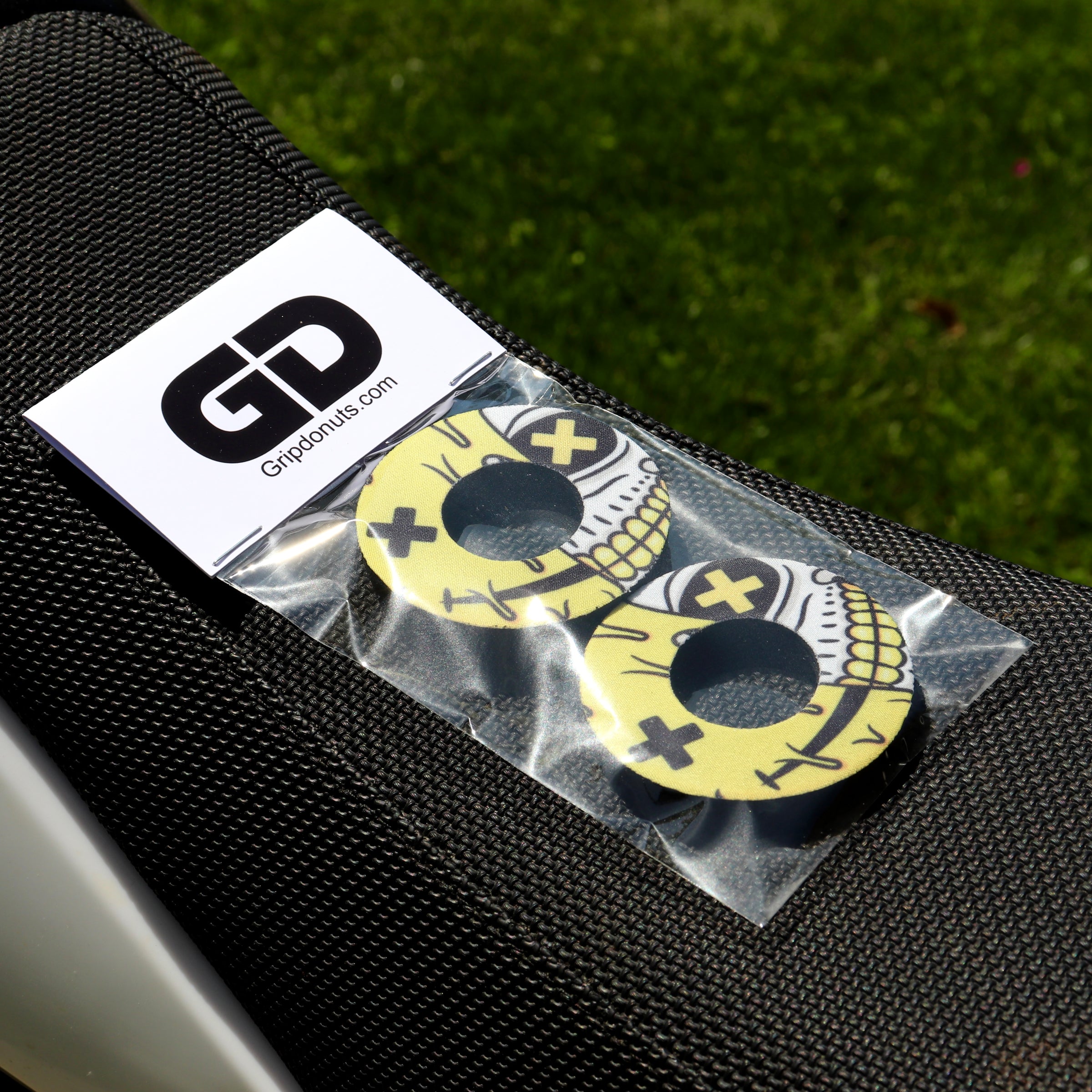 Official Gripdonuts.com - Melting Smiley Face Dirt Bike Grip Donuts